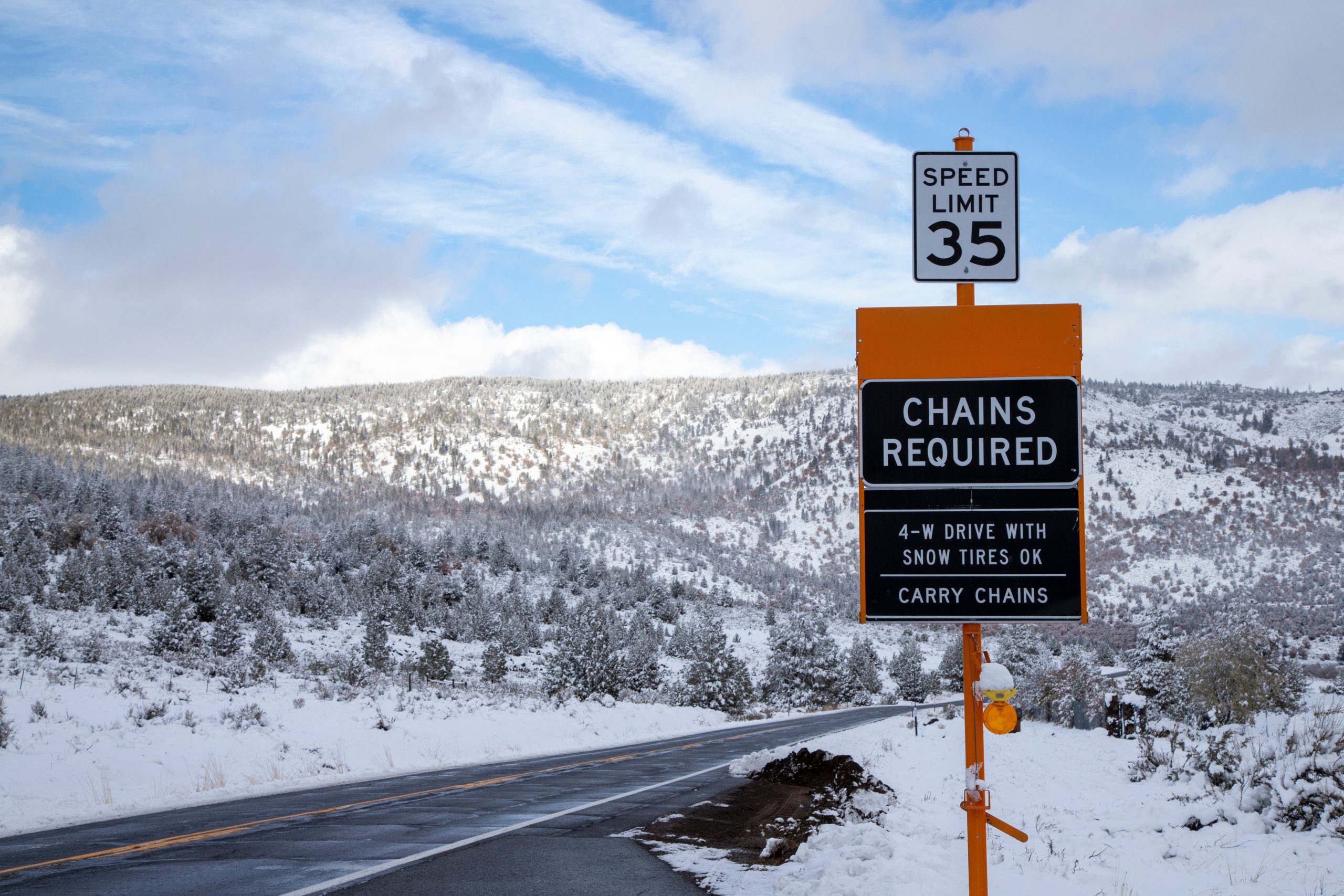 Skid Steer Snow Tires vs. Tracks and Chains For Traction